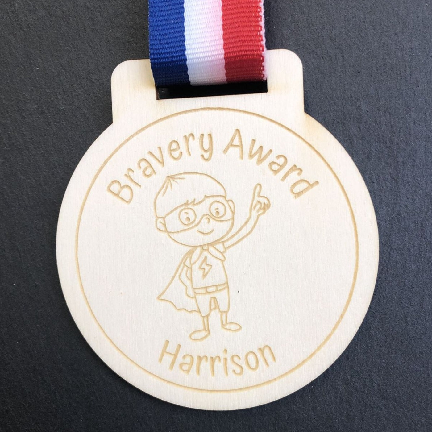 Personalised Bravery Super Boy Wooden Medal – North East Trophies